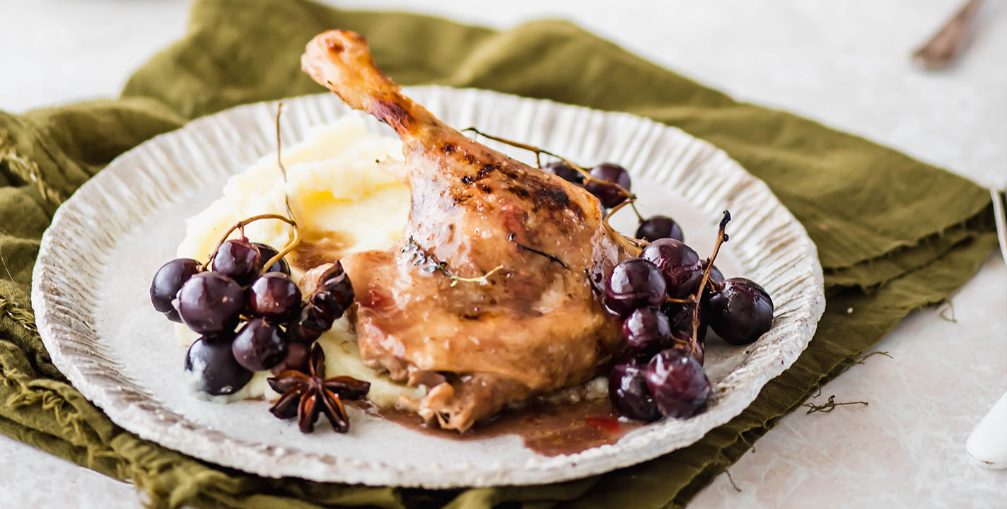 Confit Duck Legs with Roast Grapes served on Mash Potato Recipe | Luv-a ...